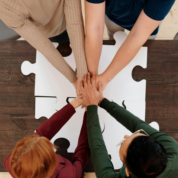 Team Building with Custom Puzzles - The Missing Piece Puzzle Company